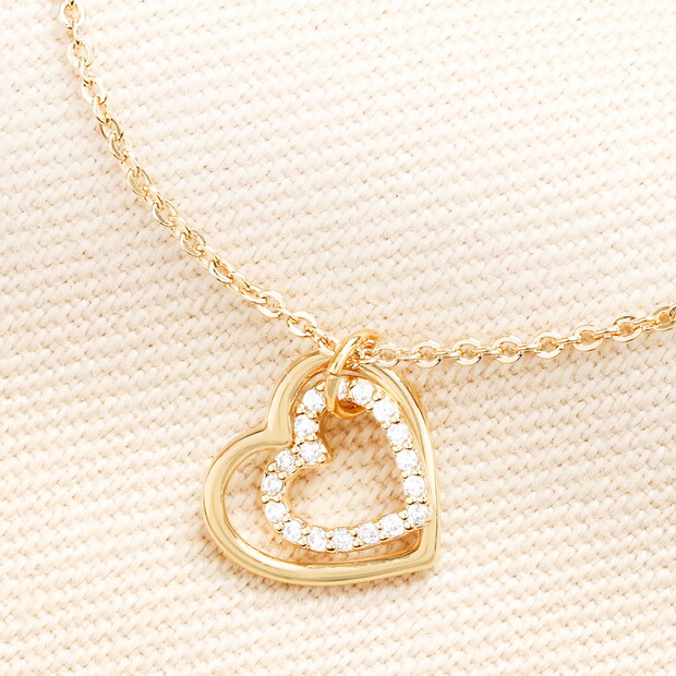 Sterling Silver Interlocking Crystal Heart Charm Bracelet in Gold ...